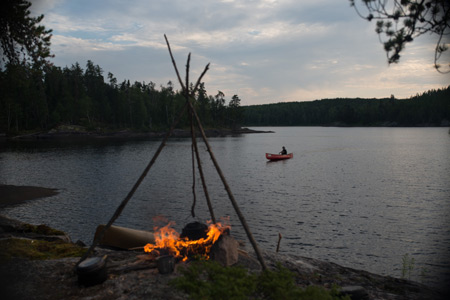 Ray paddling back to a welcoming camp fire | The Ray Mears & Woodlore ...